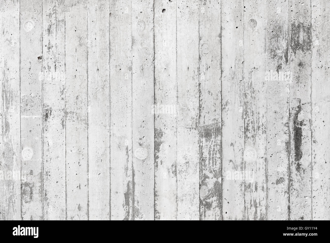 White concrete wall with relief pattern from timber formwork ...