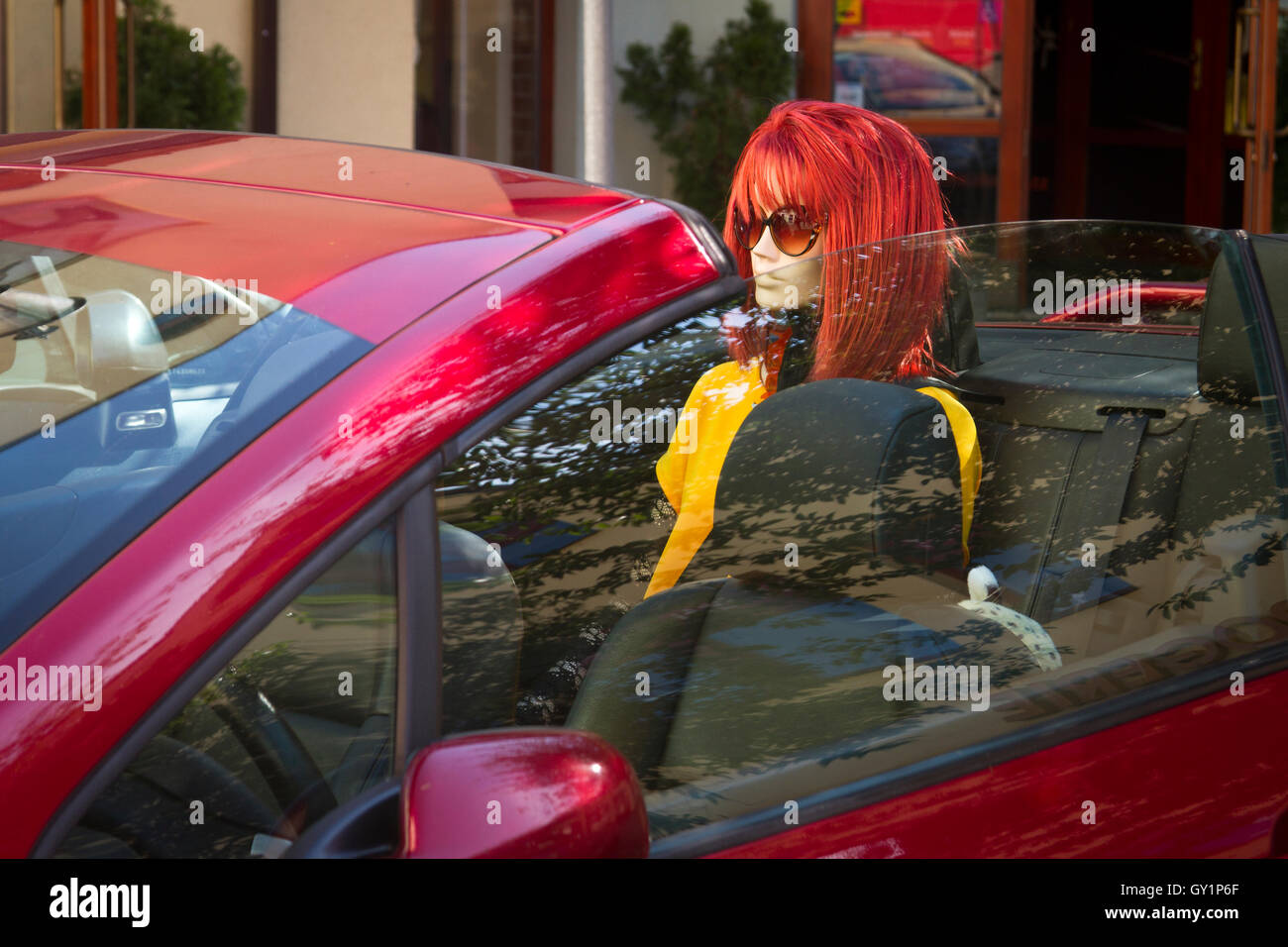 Attractive woman - mannequin- sitting in cabrio car Stock Photo - Alamy