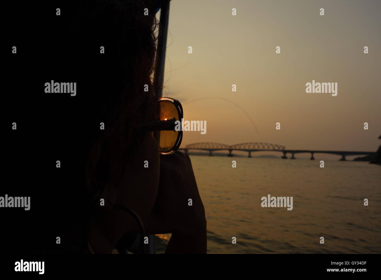 Sunset through a sunglass Stock Photo - Alamy
