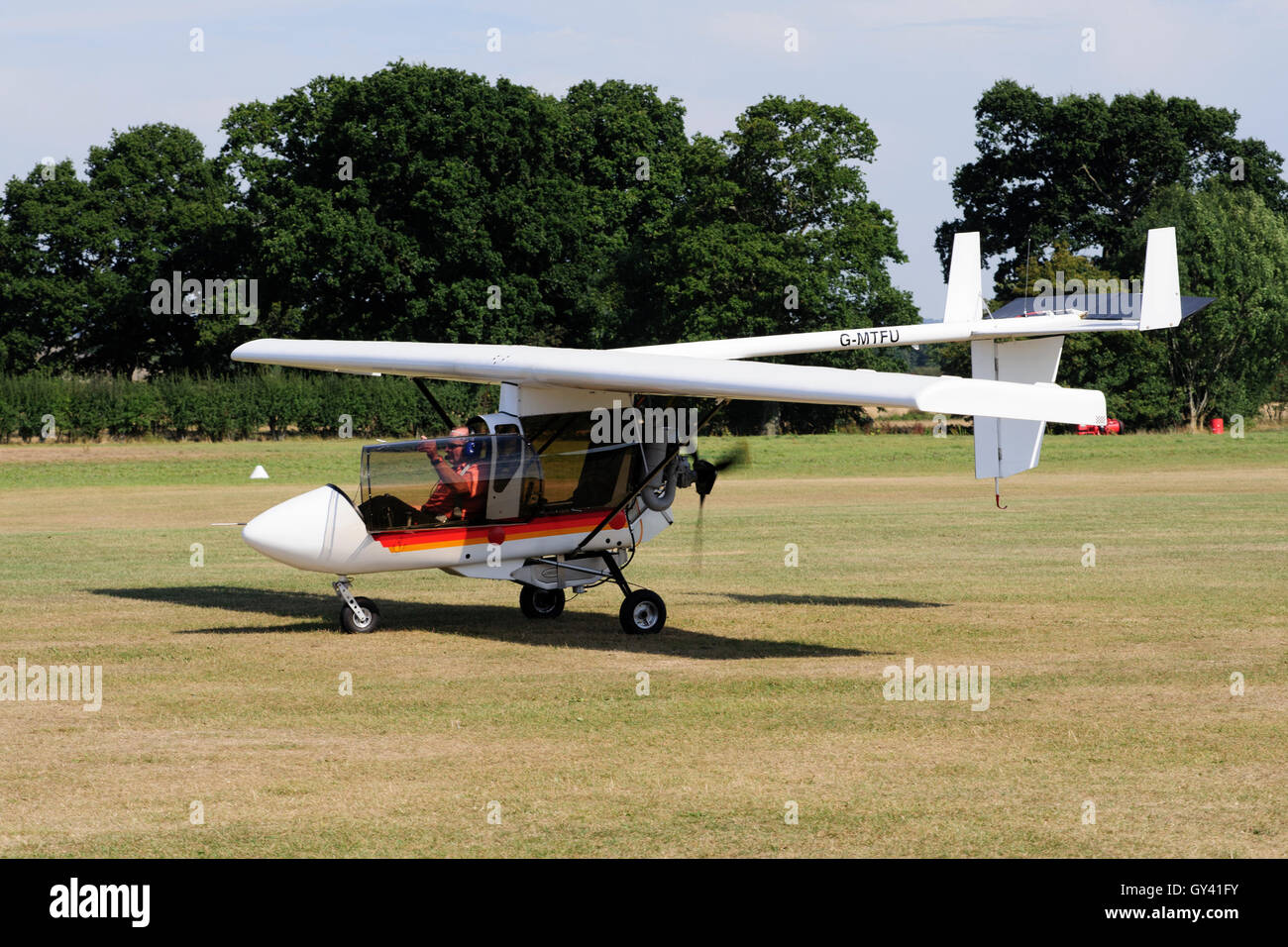 small microlight type aircraft taxiing at headcorn airfield in kent ...