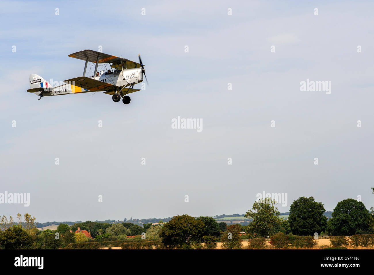 vintage tiger moth aircraft in flight at headcorn airfield in kent ...