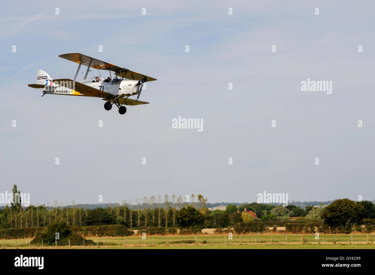 vintage tiger moth aircraft in flight at headcorn airfield in kent ...