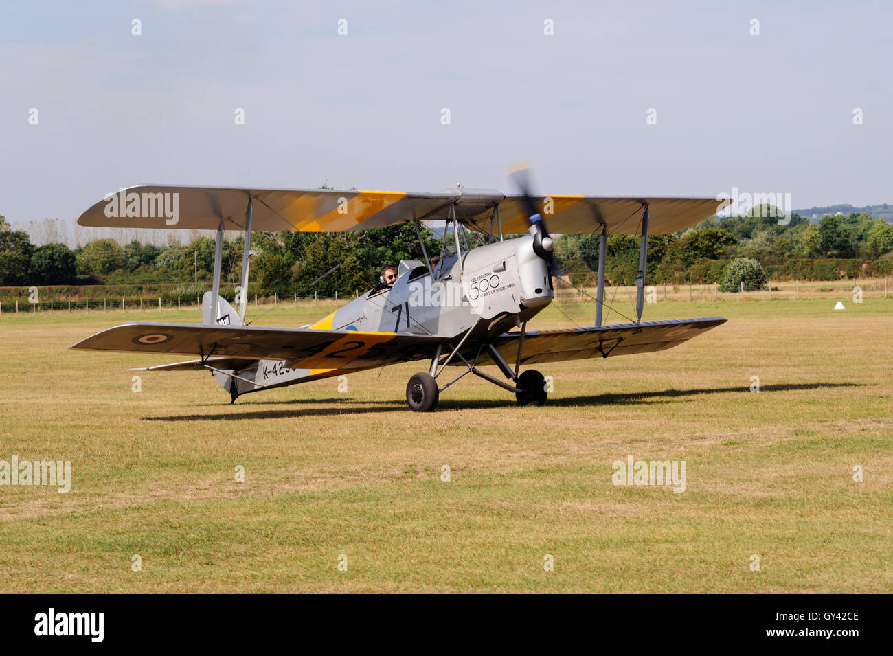 vintage tiger moth aircraft taxiing at headcorn airfield in kent ...