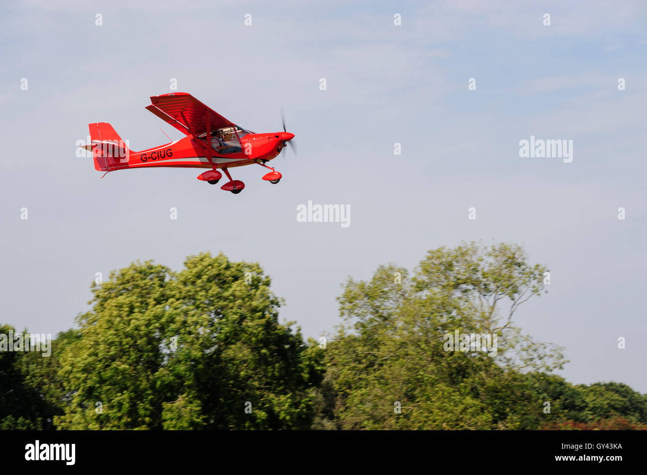 small light aircraft in flight at headcorn airfield in kent england uk ...