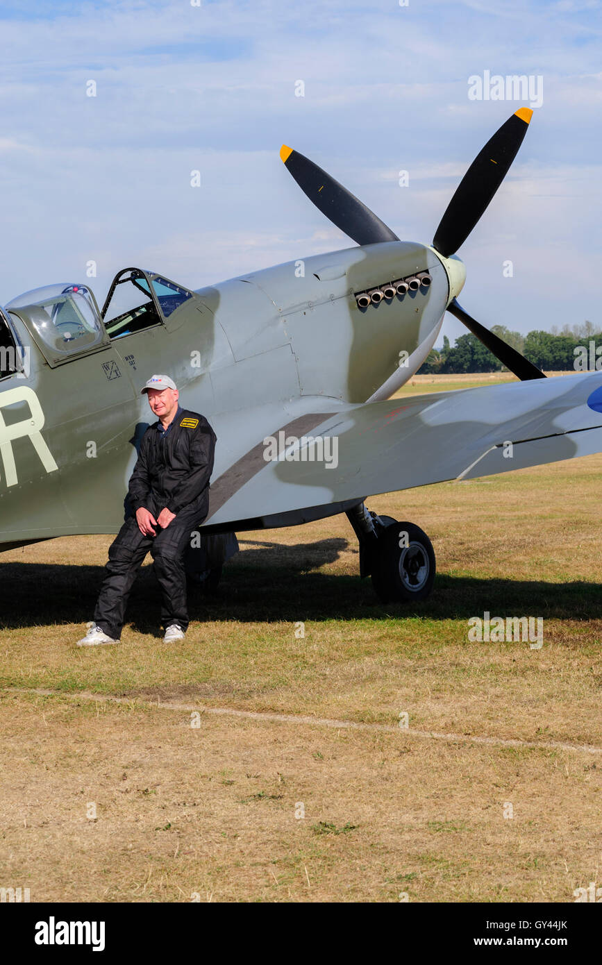 pilot with military spitfire trainer aircraft at headcorn airfield in ...