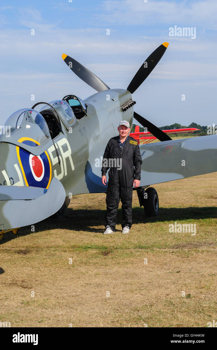 pilot with military spitfire trainer aircraft at headcorn airfield in ...