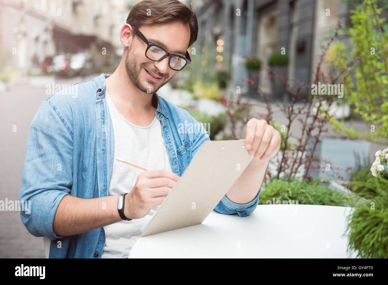 Talented young artist drawing a picture Stock Photo - Alamy