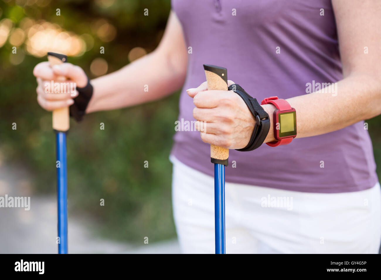 Fit aged woman getting ready for her walk Stock Photo - Alamy
