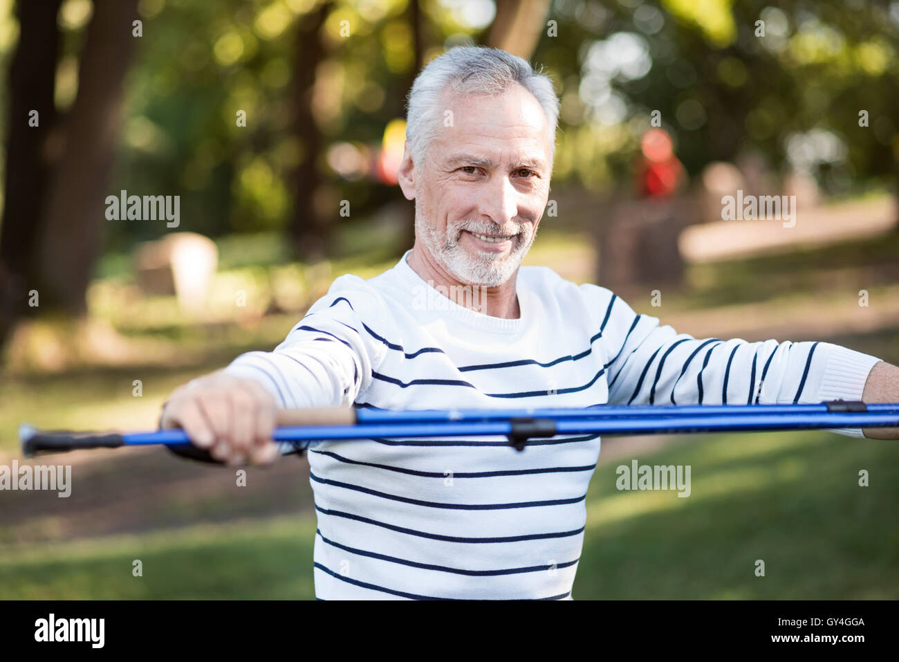 Handsome old man doing sports outdoors Stock Photo - Alamy