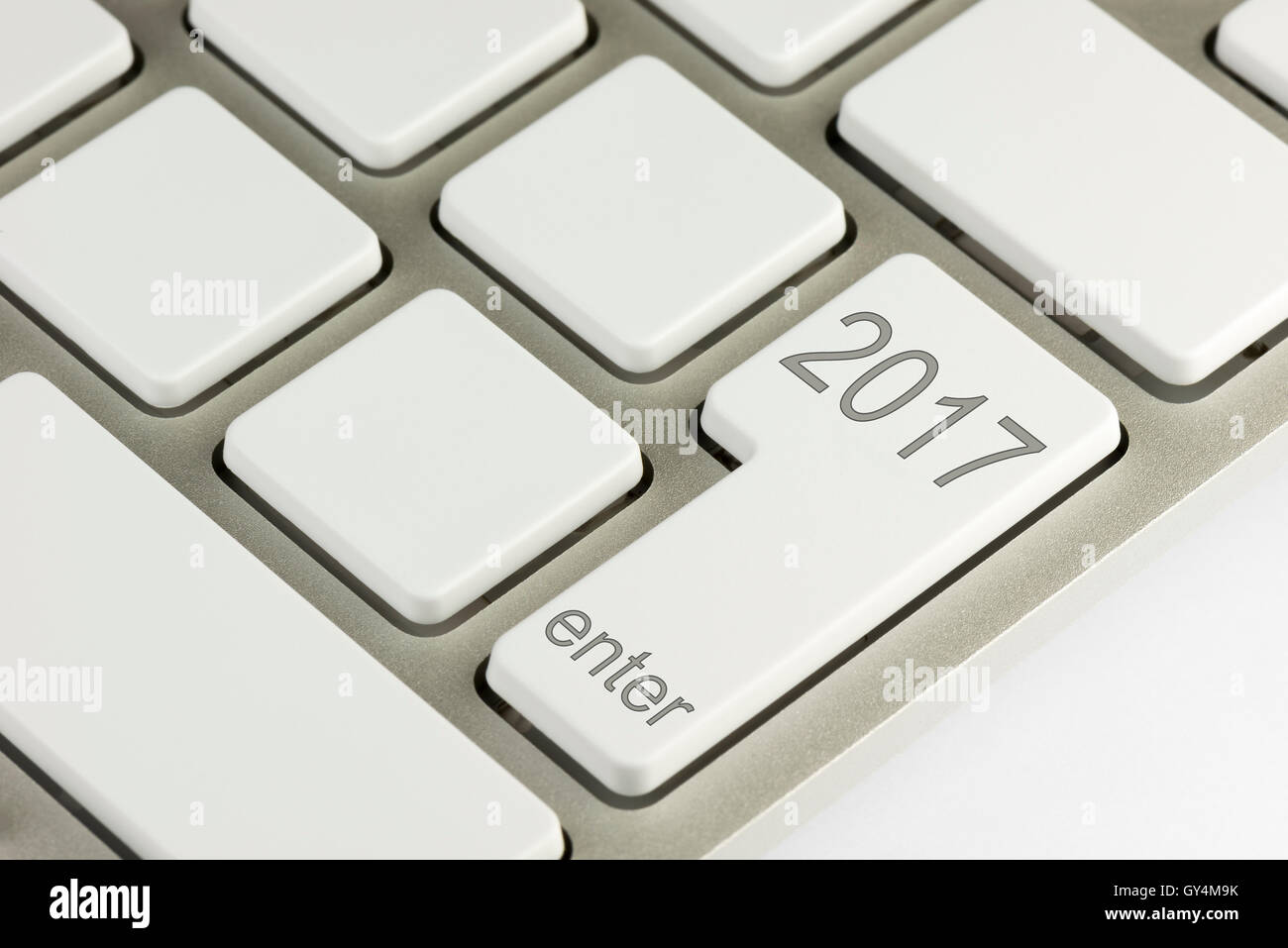 Metal keyboard with white keys and two thousand seventeen on the enter ...