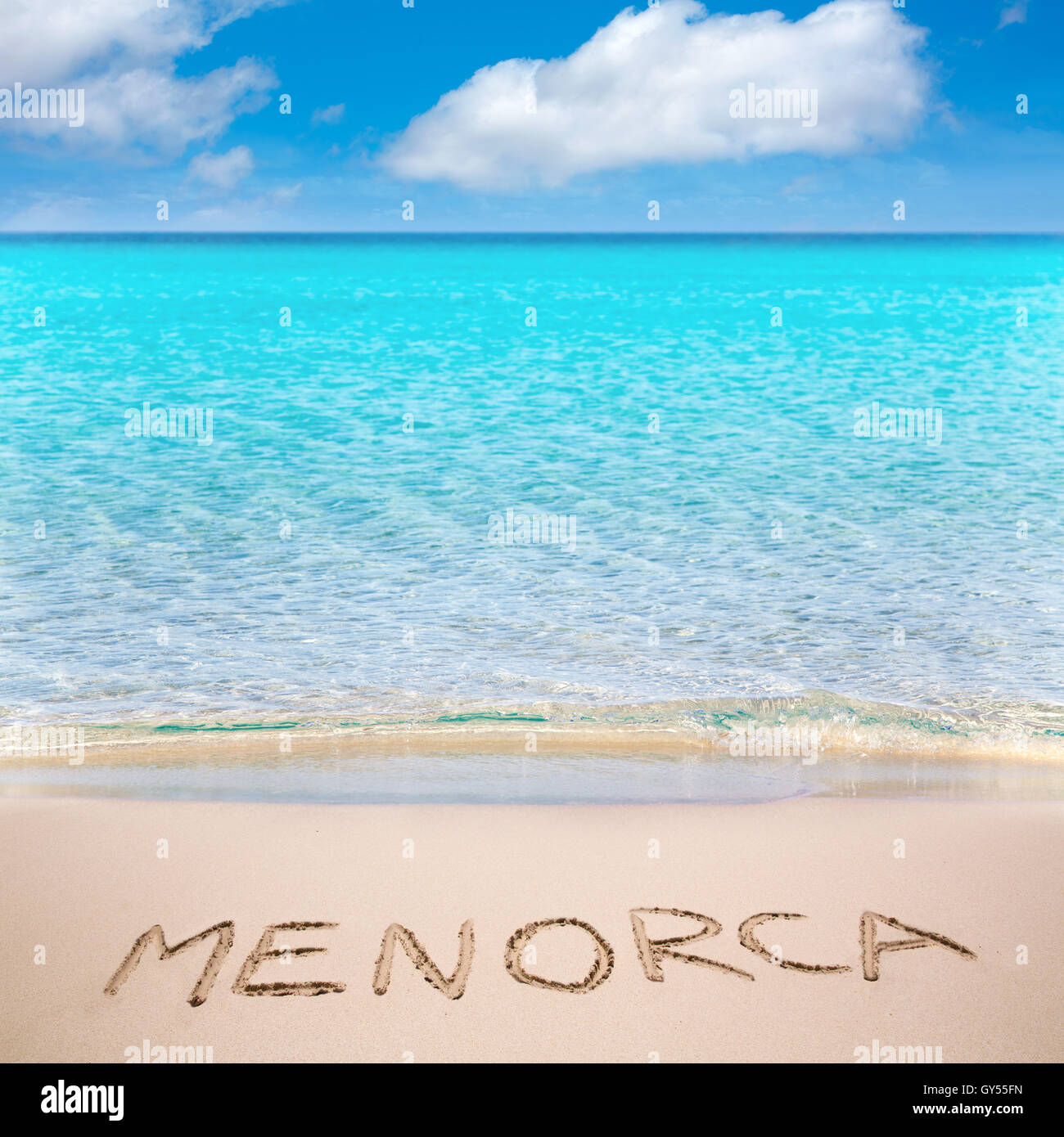 Menorca word written on sand of mediterranean beach Stock Photo - Alamy
