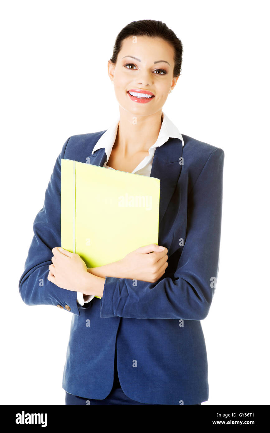 Attractive woman holding files Stock Photo - Alamy