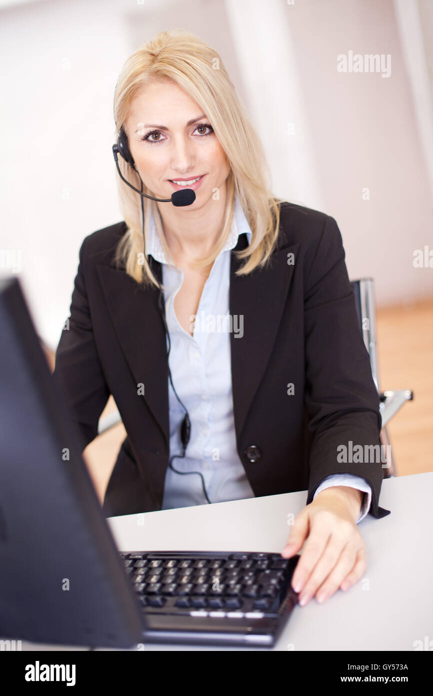 Beautiful call center operator Stock Photo - Alamy