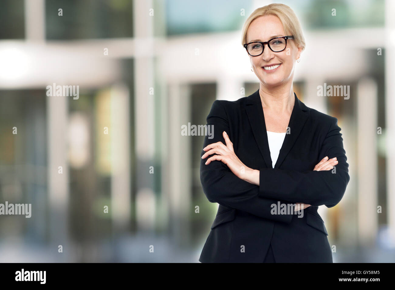 Confident middle aged female executive Stock Photo - Alamy