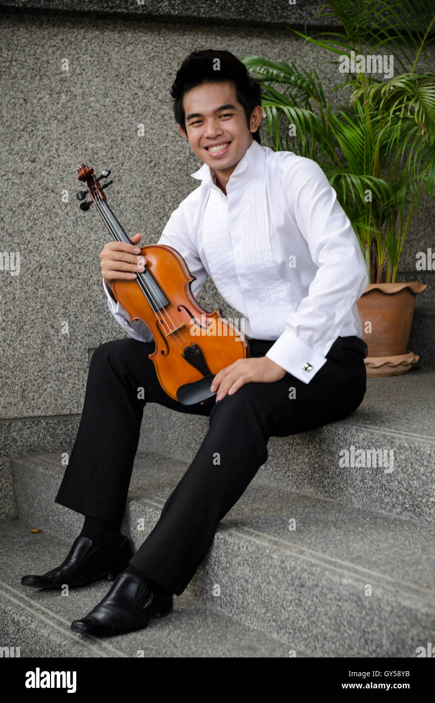 asia man with his violin Stock Photo - Alamy