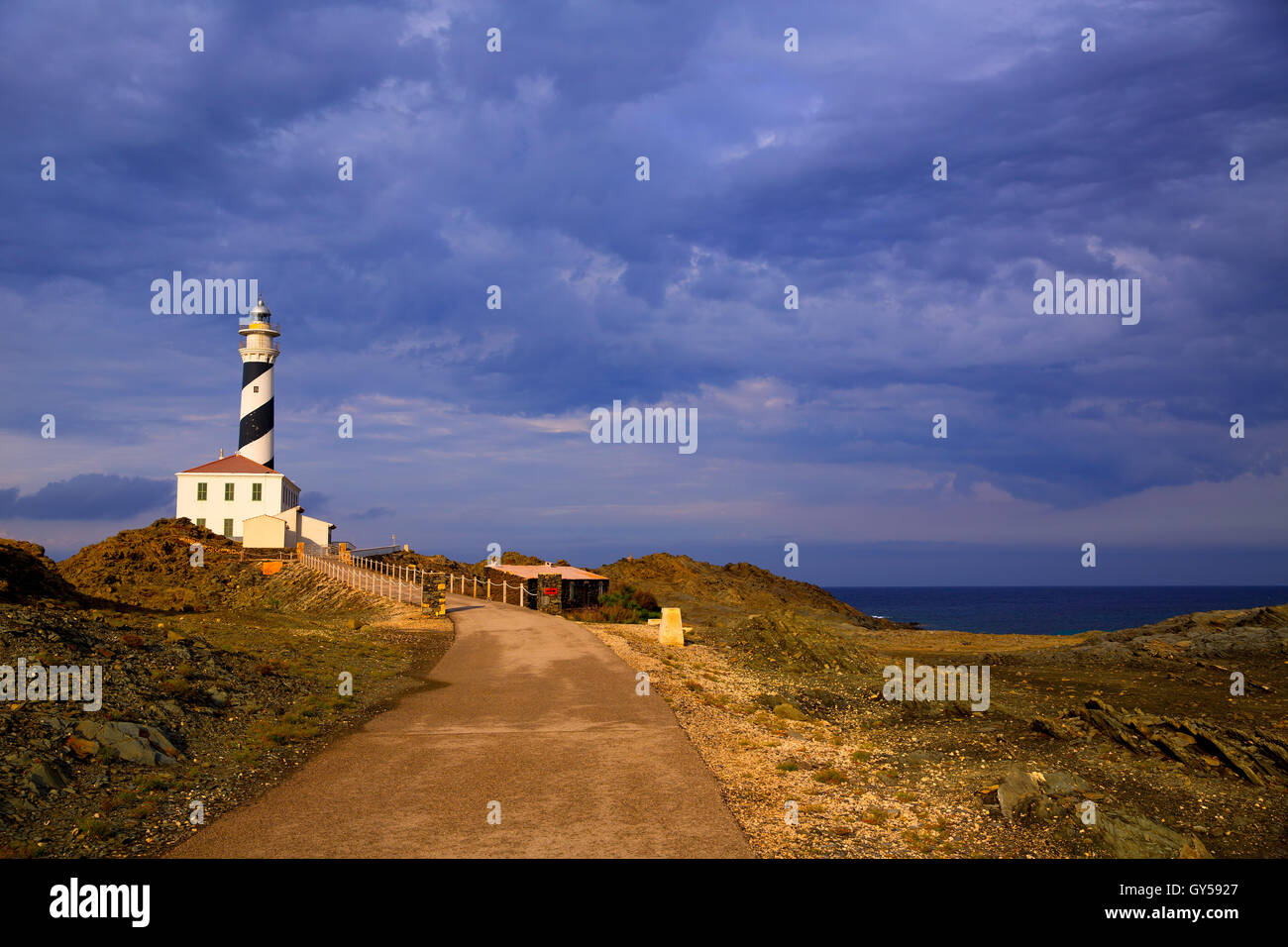 Cap de Favaritx sunset lighthouse cape in Mahon Stock Photo - Alamy