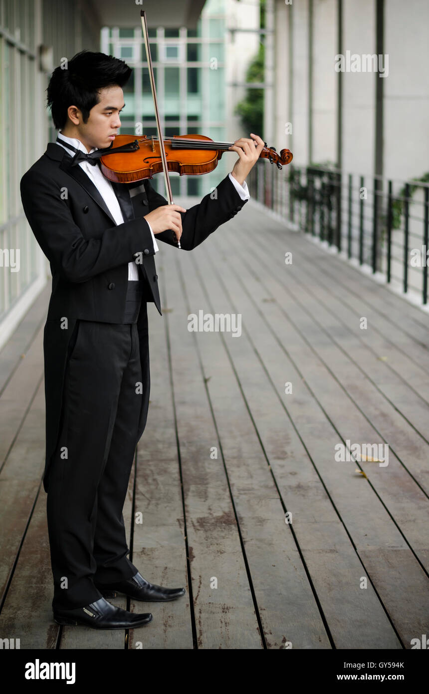 asia man with his violin Stock Photo - Alamy