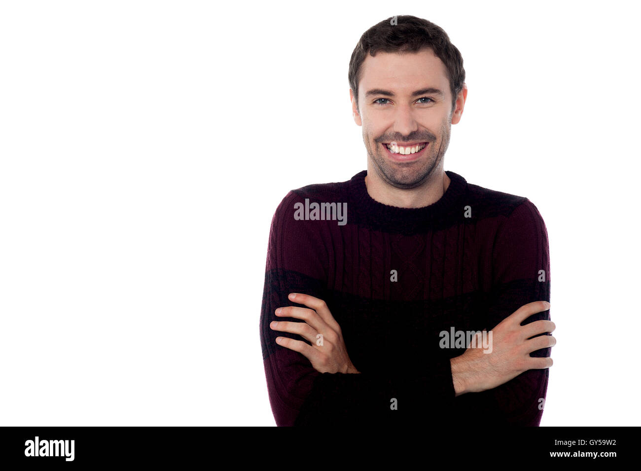 Handsome young guy, arms crossed Stock Photo - Alamy