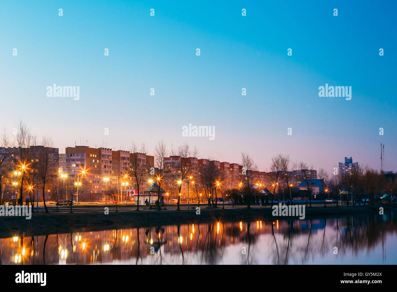 The View Of Urban Residential Area Overlooks To City Lake And Park In ...