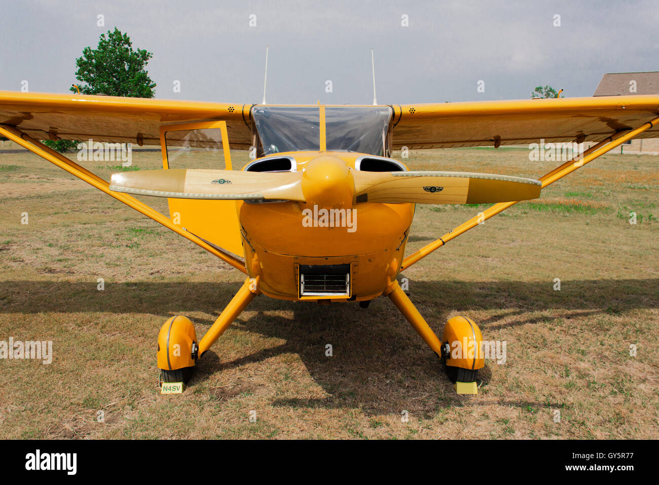 Yellow Plane on the Ground Stock Photo - Alamy