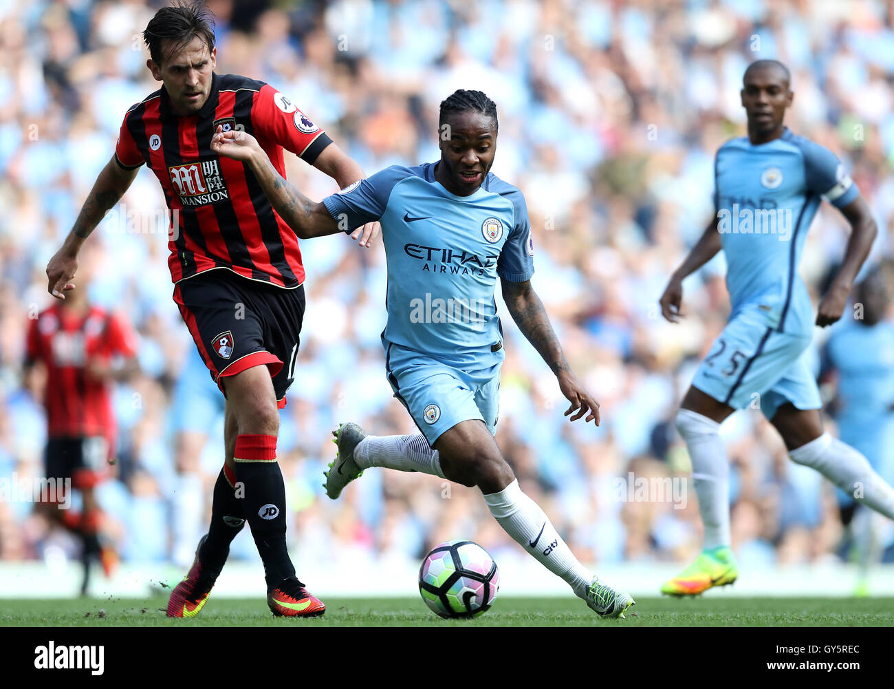 Manchester City's Raheem Sterling and AFC Bournemouth's Adam Smith ...