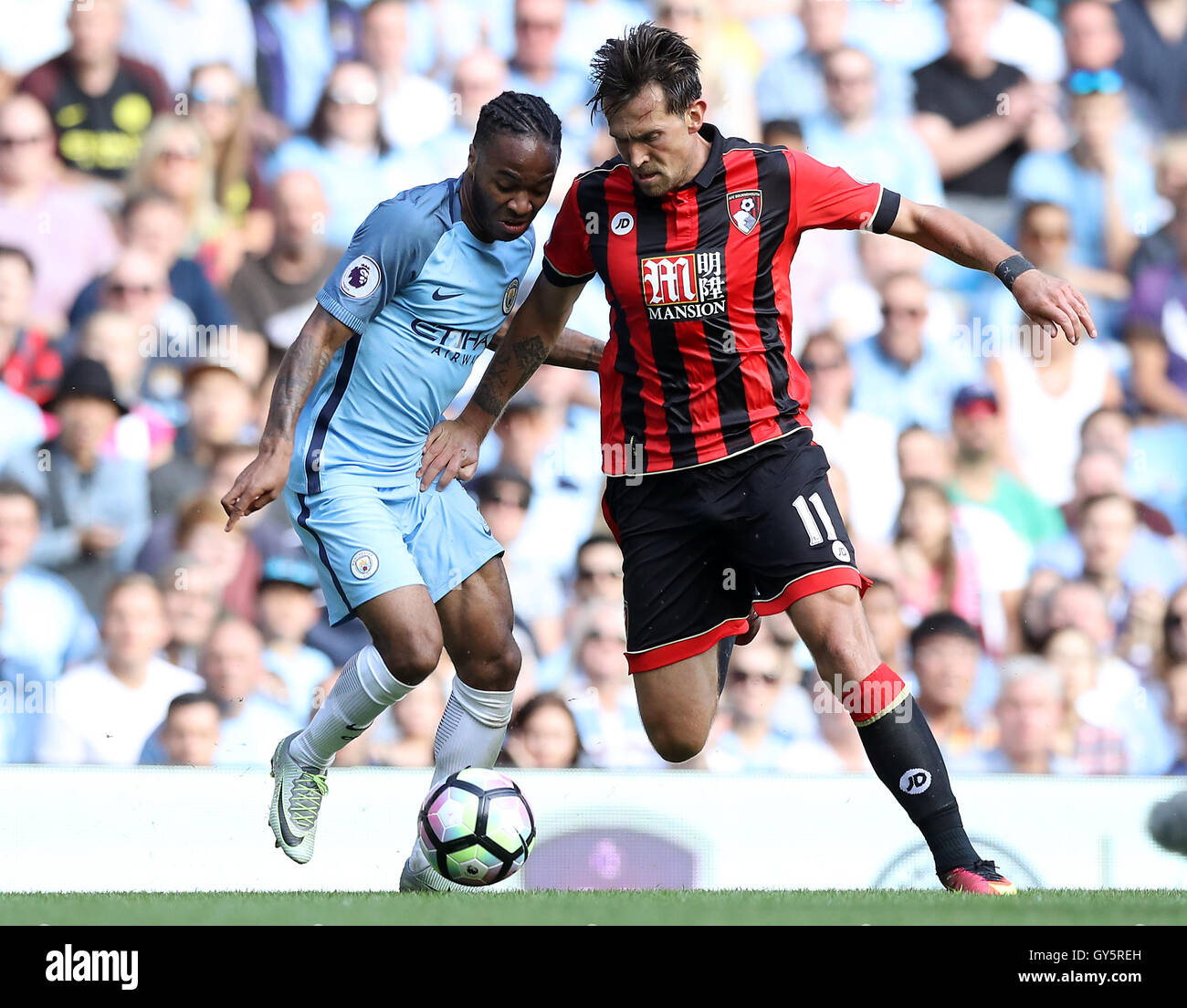 Manchester City's Raheem Sterling and AFC Bournemouth's Adam Smith ...