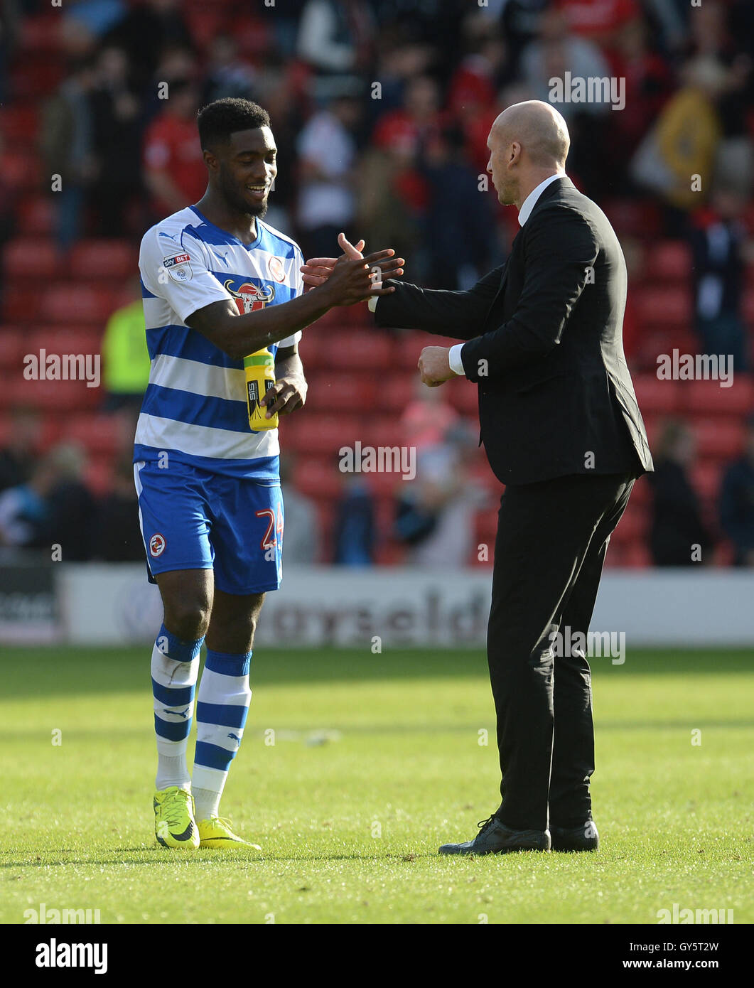 Reading manager Jaap Stam celebrates with Tyler Blackett after their ...
