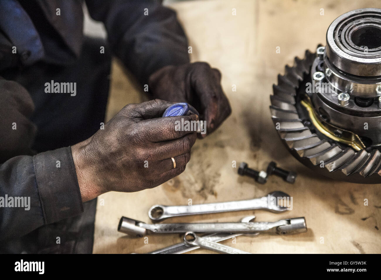 Working men with dirty hands and tools Stock Photo - Alamy