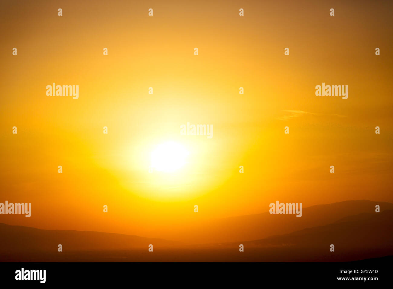 the blurred sun falling down arabian mountain in oman Stock Photo - Alamy