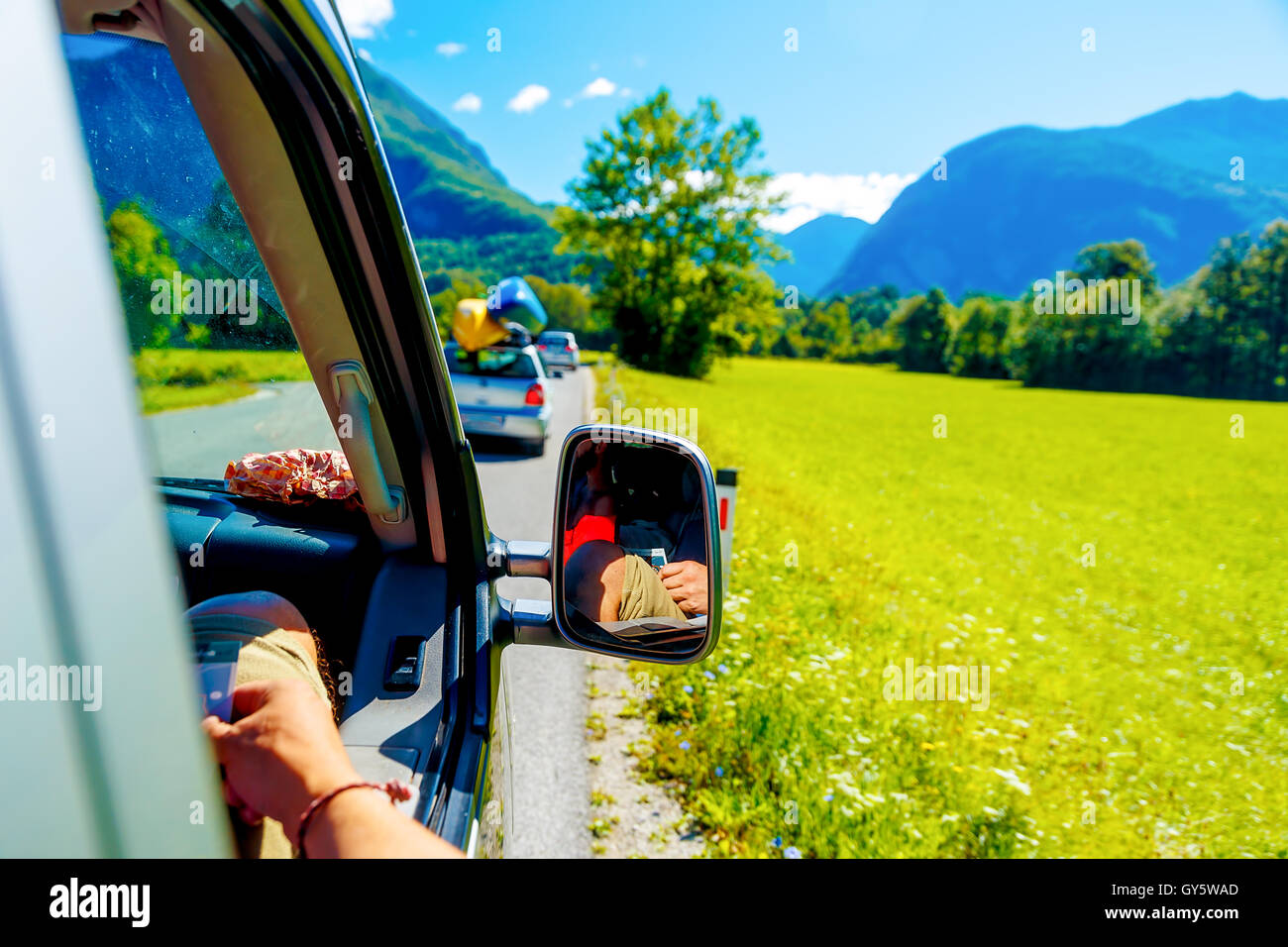 free summer car travelling road trip in beautiful mountain landscape ...