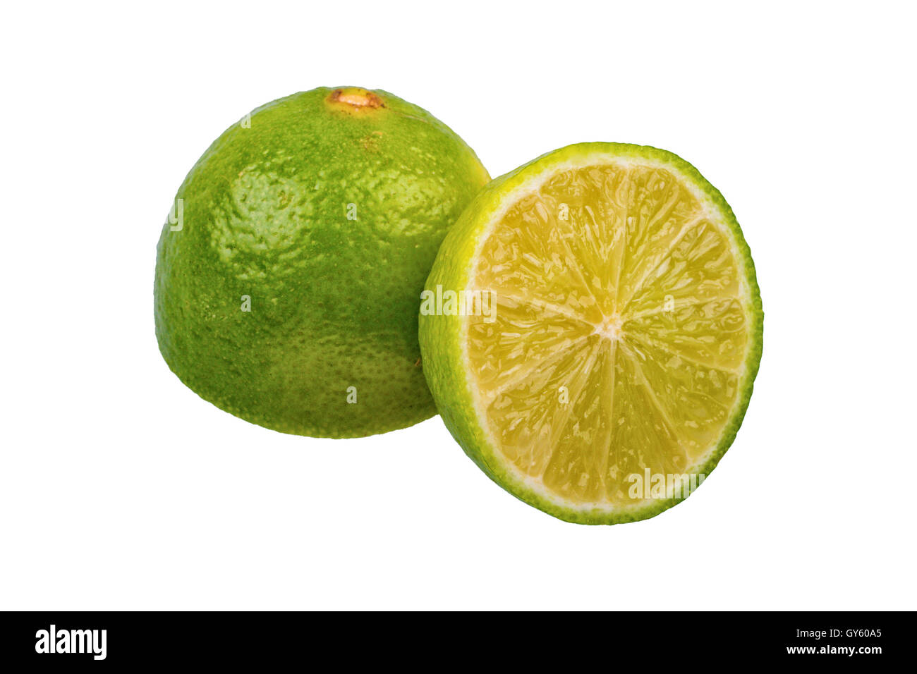 Cut lime isolated on a white background Stock Photo - Alamy