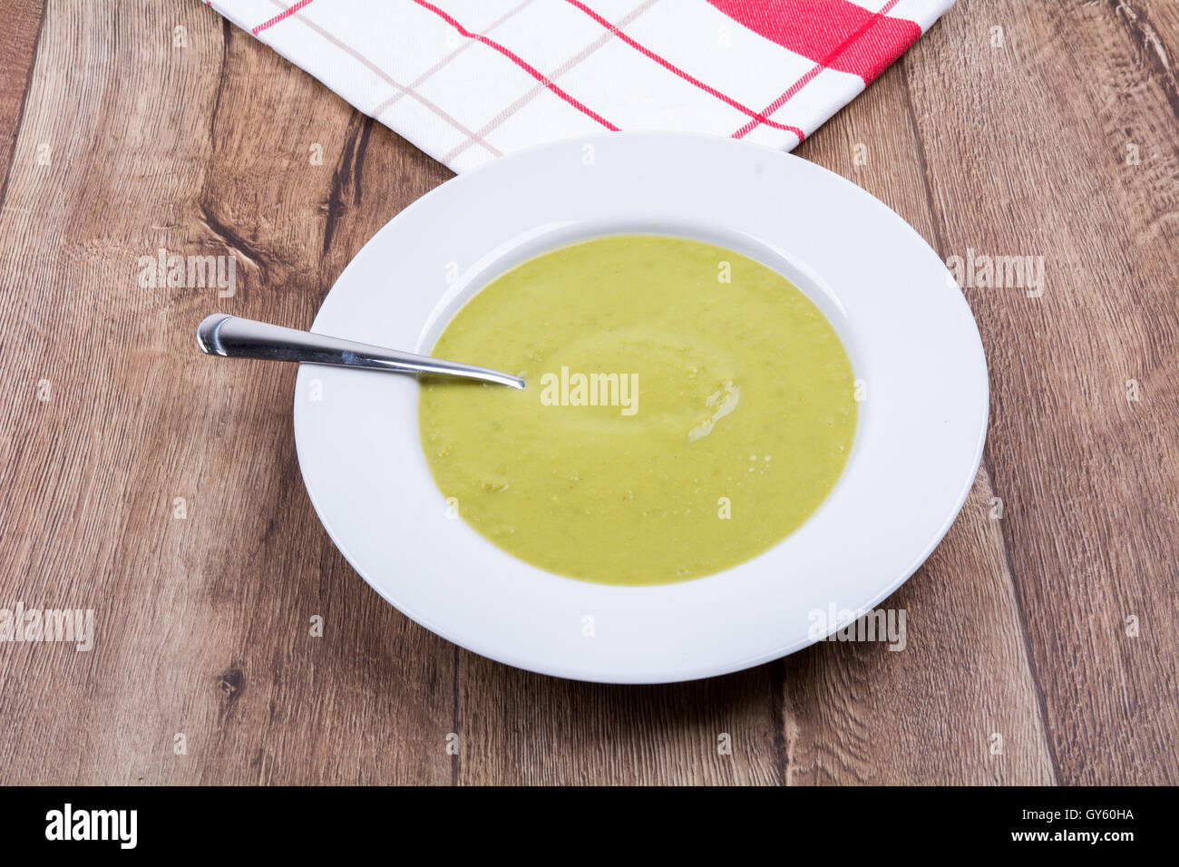 Vegetable split pea soup on a brown wooden background Stock Photo - Alamy