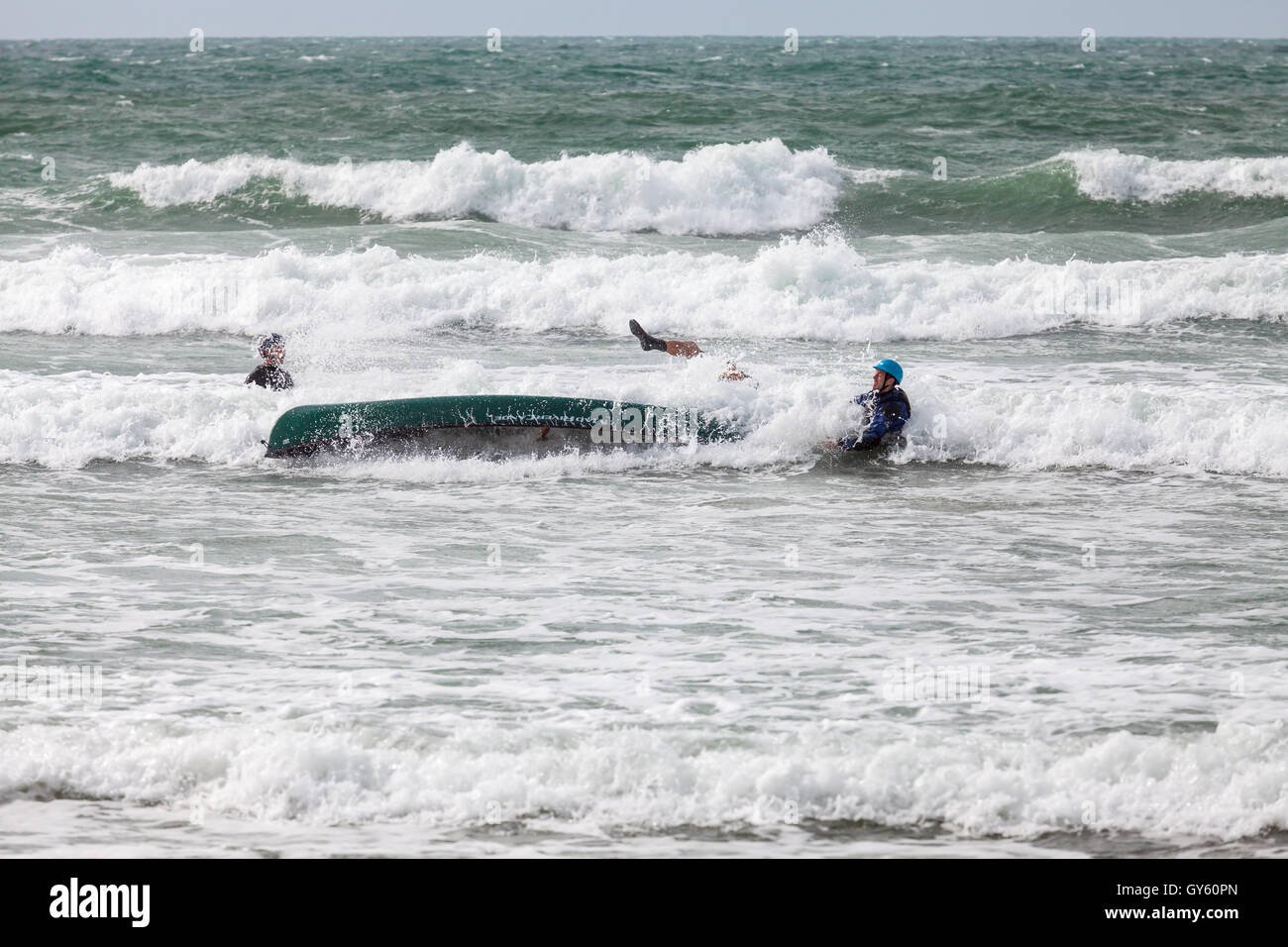 Canoe in the surf at Newgale, Pembrokeshire Stock Photo - Alamy