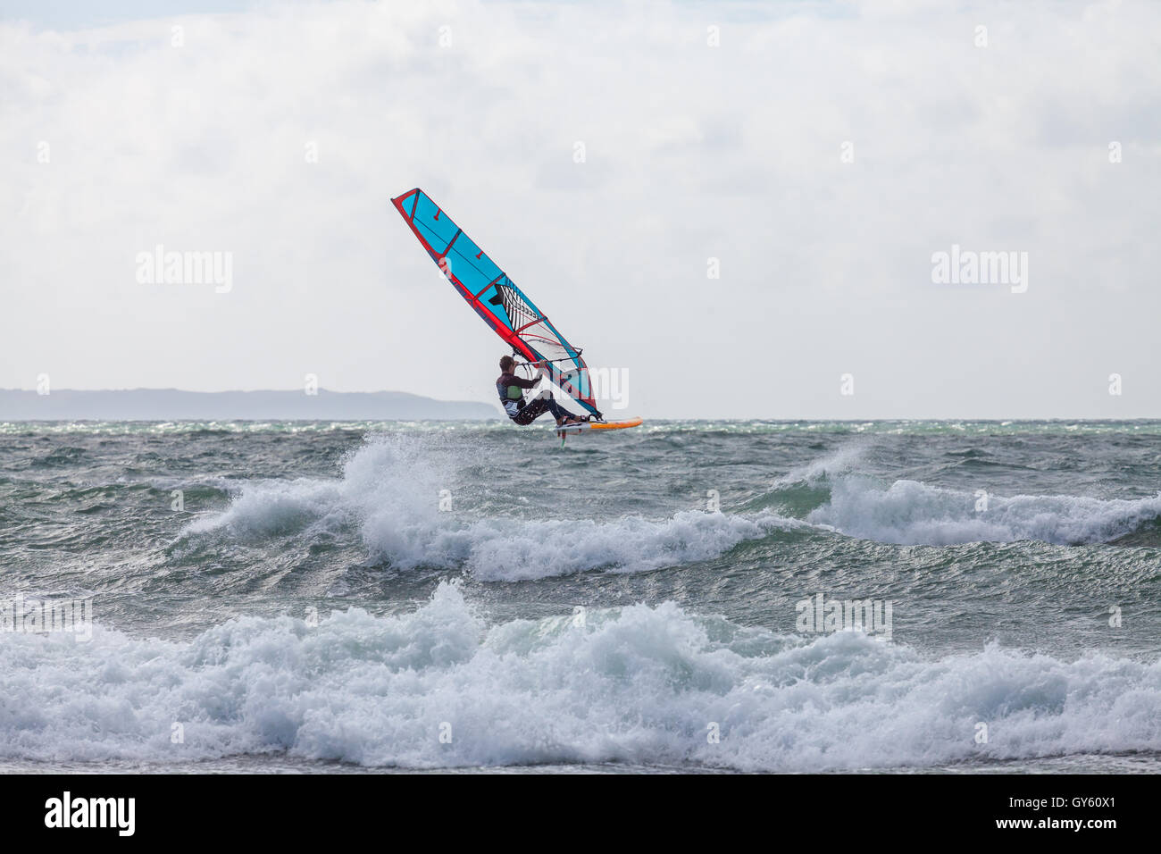 Newgale beach pembrokeshire surfer hi-res stock photography and images ...