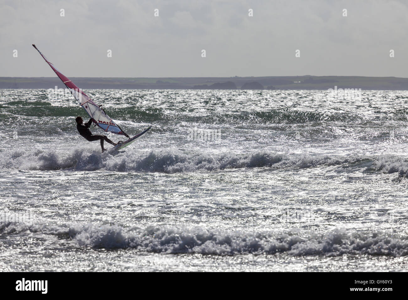 Newgale beach pembrokeshire surfer hi-res stock photography and images ...