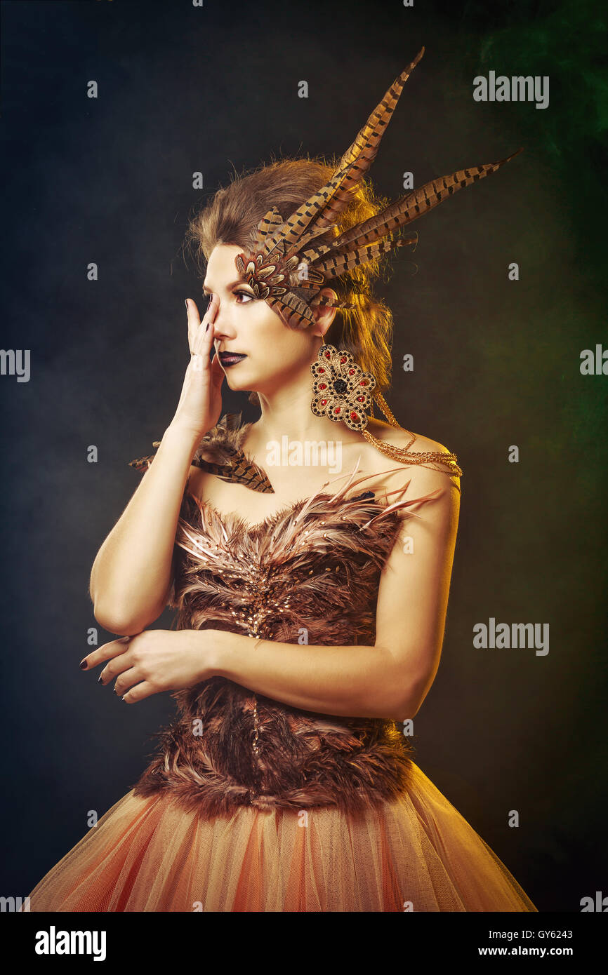 Girl harpy. Creative makeup for Halloween. The concept of magic ...