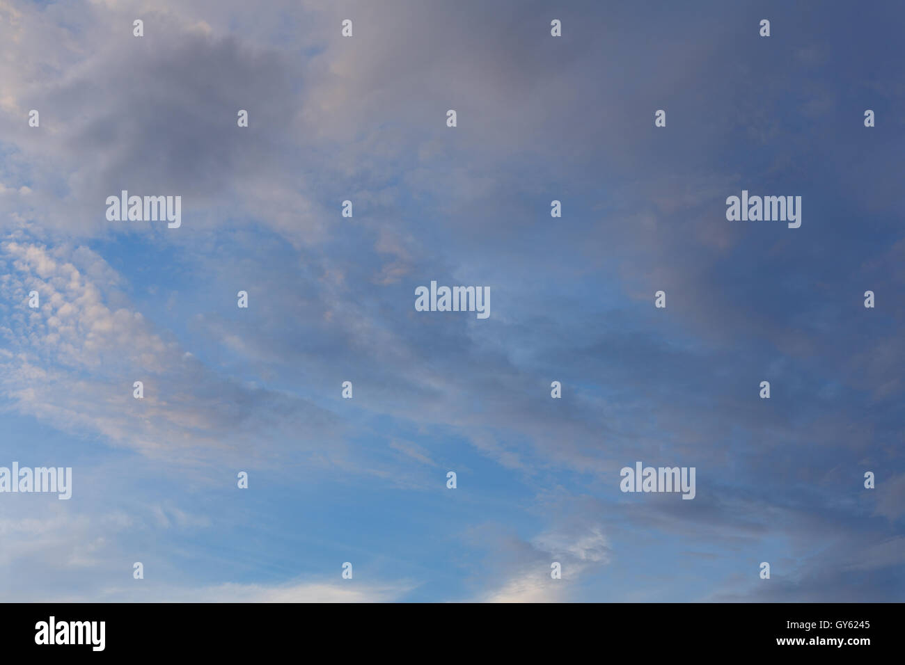 Cumulus clouds against a blue sky. Mostly Cloudy. Cyclone. Weather ...