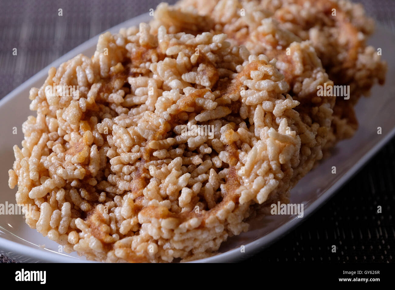 Rice cake served in northern Thailand Stock Photo - Alamy
