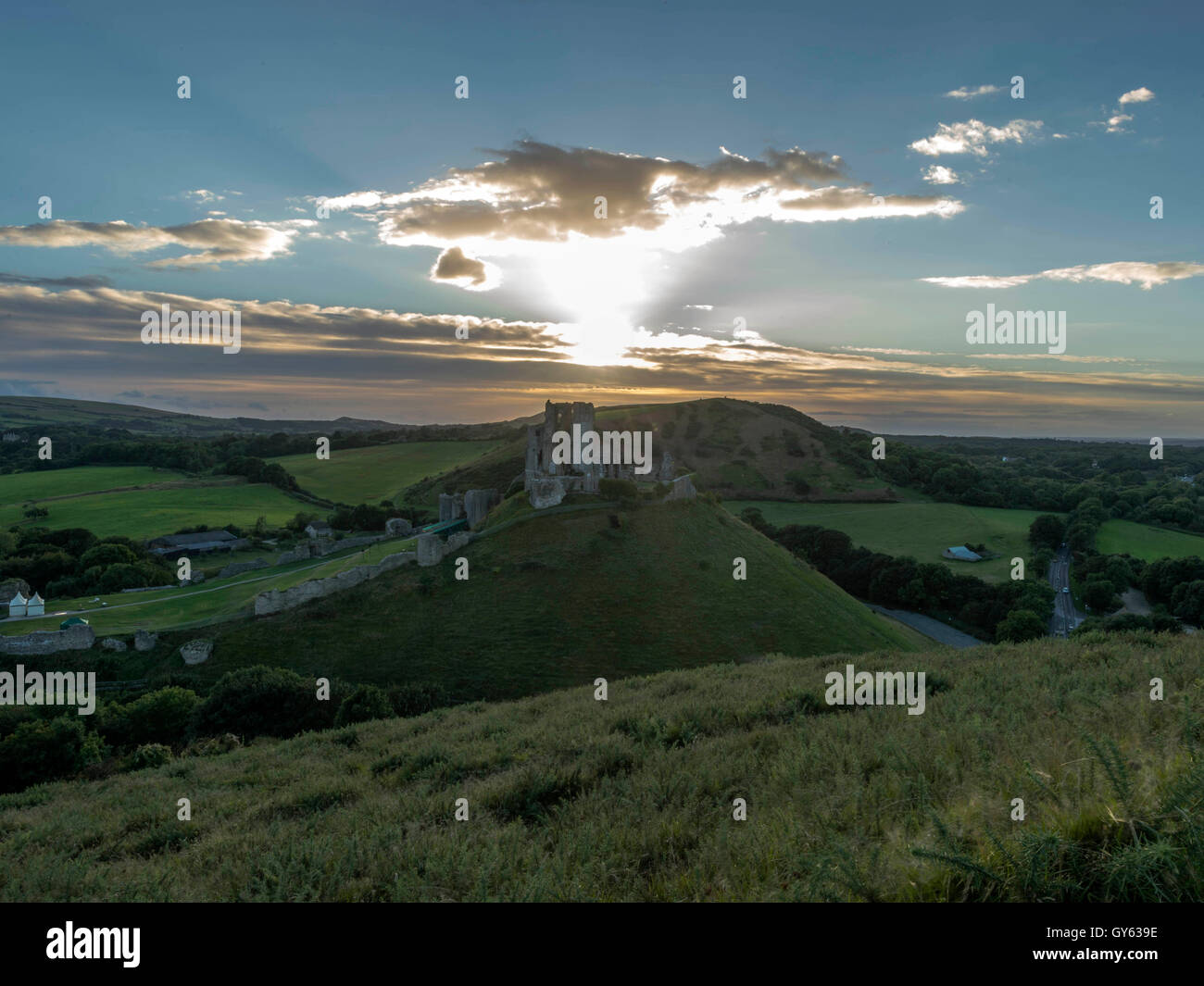 Landscape depicting late summer sunset at Corfe Castle, Dorset, UK ...