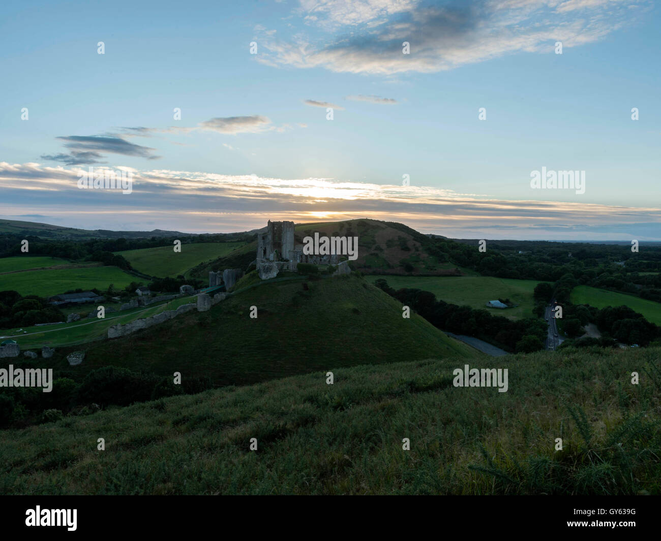 Landscape depicting late summer sunset at Corfe Castle, Dorset, UK ...