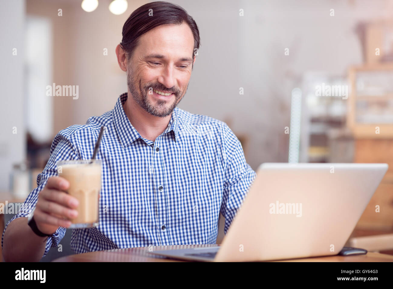 Handsome man working with computer Stock Photo - Alamy