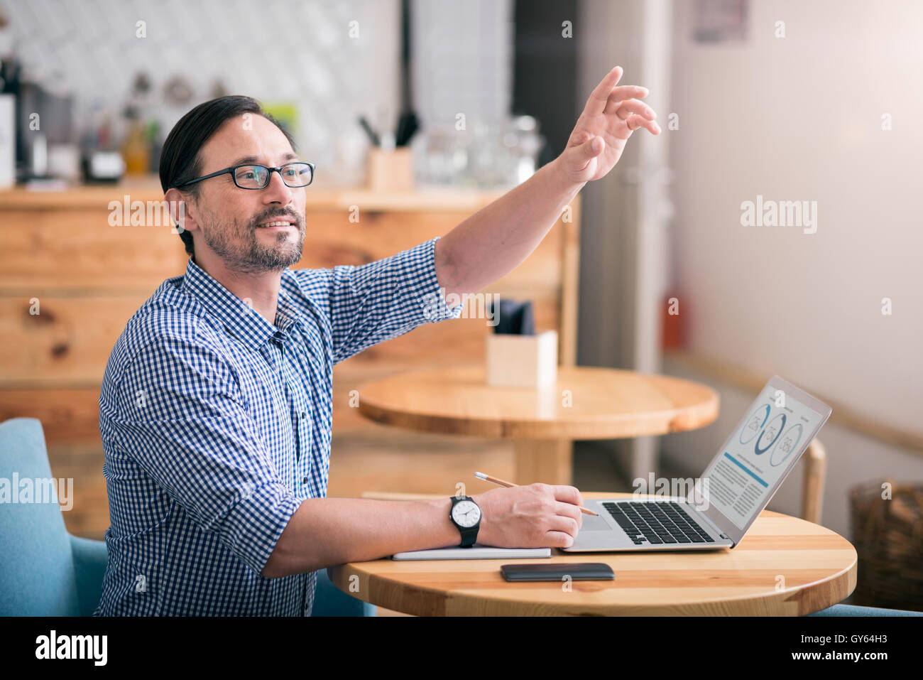Handsome man being in cafe Stock Photo - Alamy