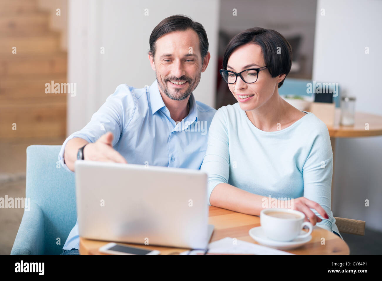 Two colleagues working together Stock Photo - Alamy
