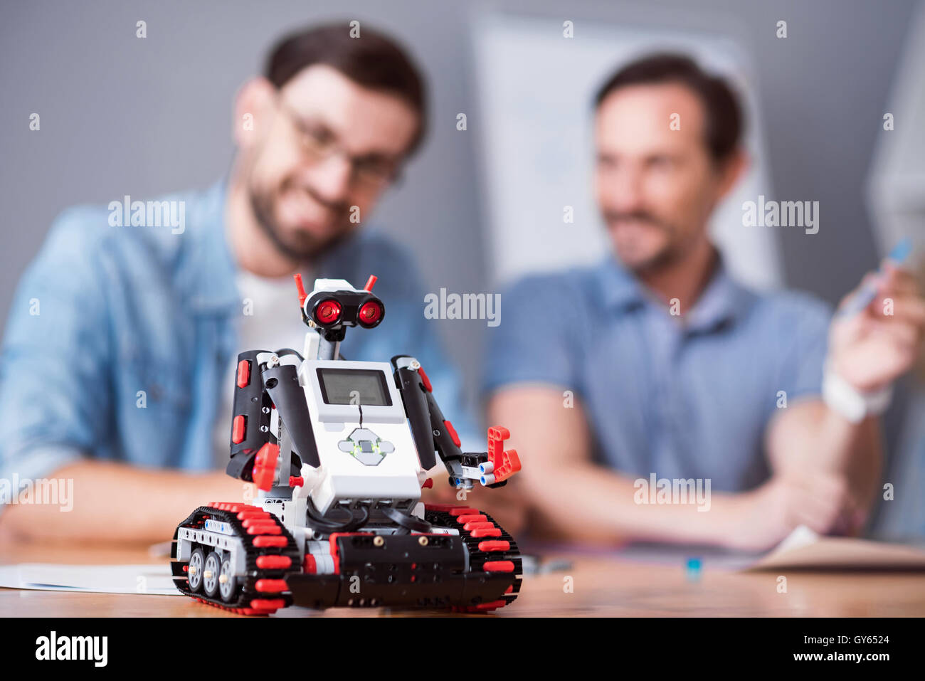 Robot standing o the table Stock Photo - Alamy