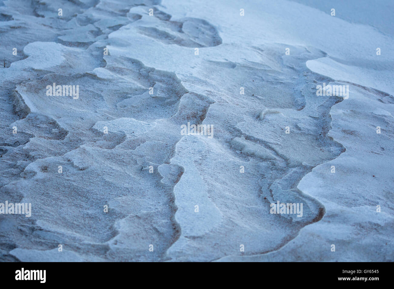 Snow and sand mixed together by wind making drifts Stock Photo - Alamy