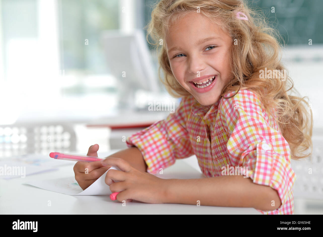 Little student girl at art class Stock Photo - Alamy