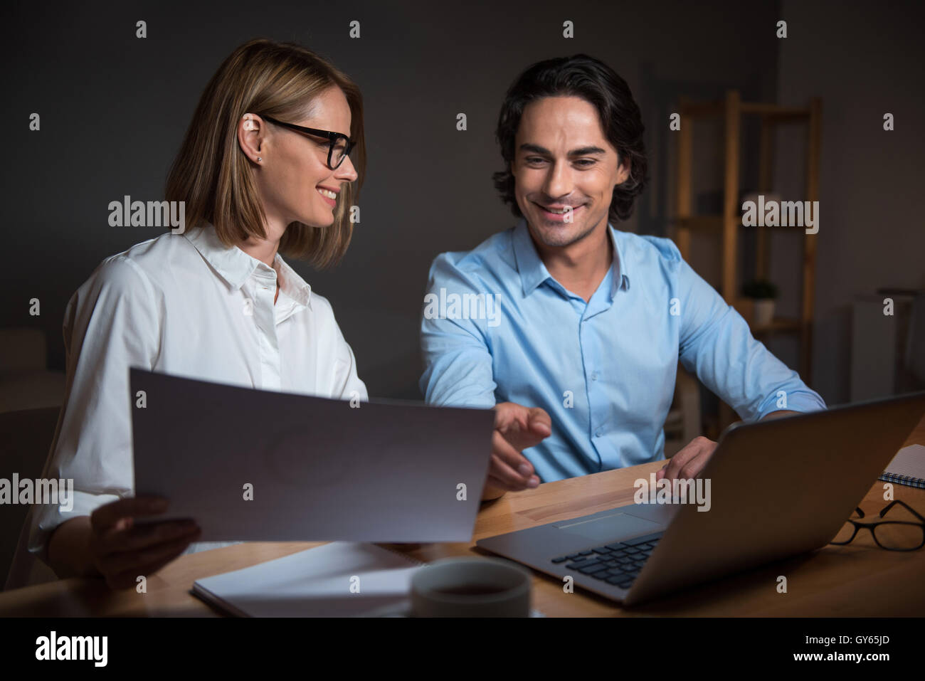 Male colleagues working documents hi-res stock photography and images ...