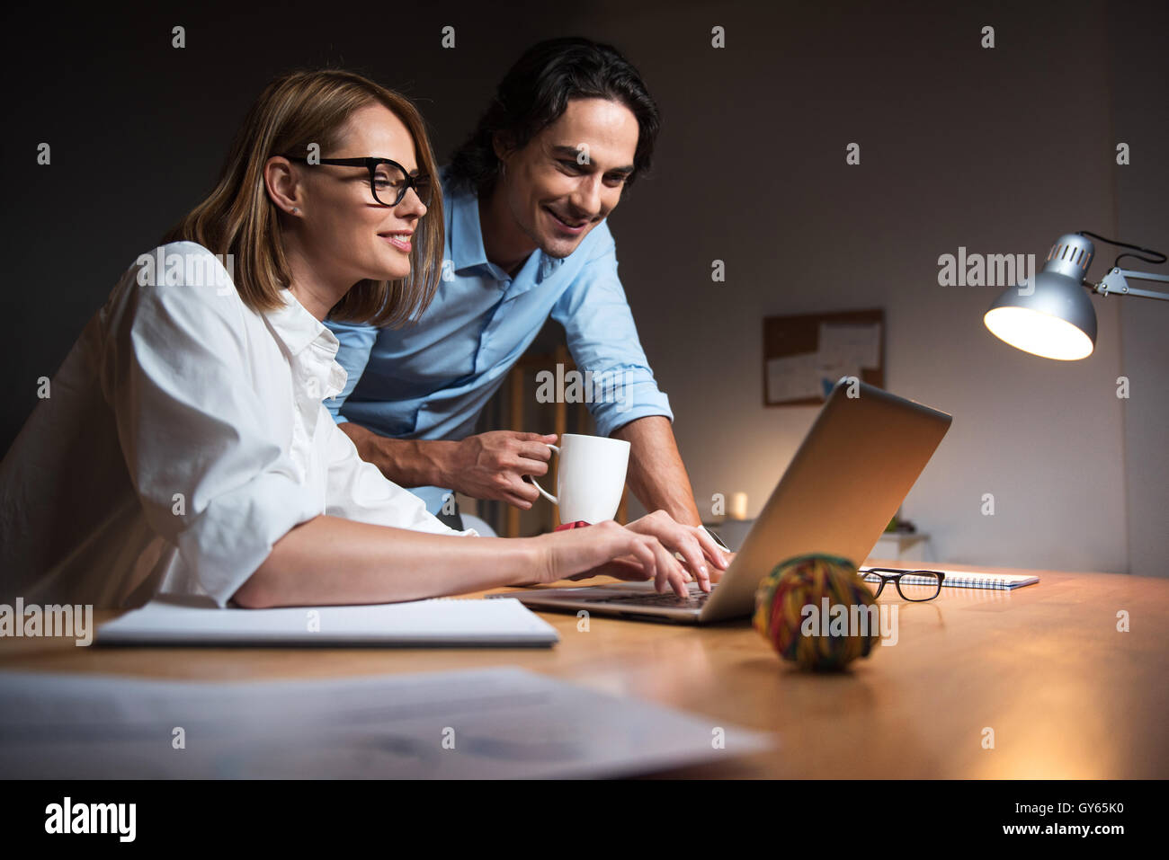 Positive colleagues working in the office Stock Photo - Alamy