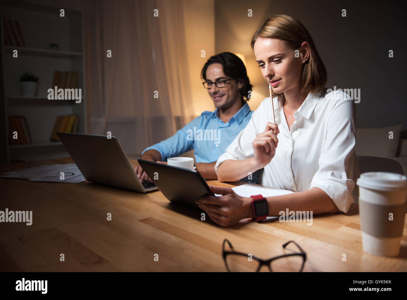Colleagues planning their work in an office Stock Photo - Alamy