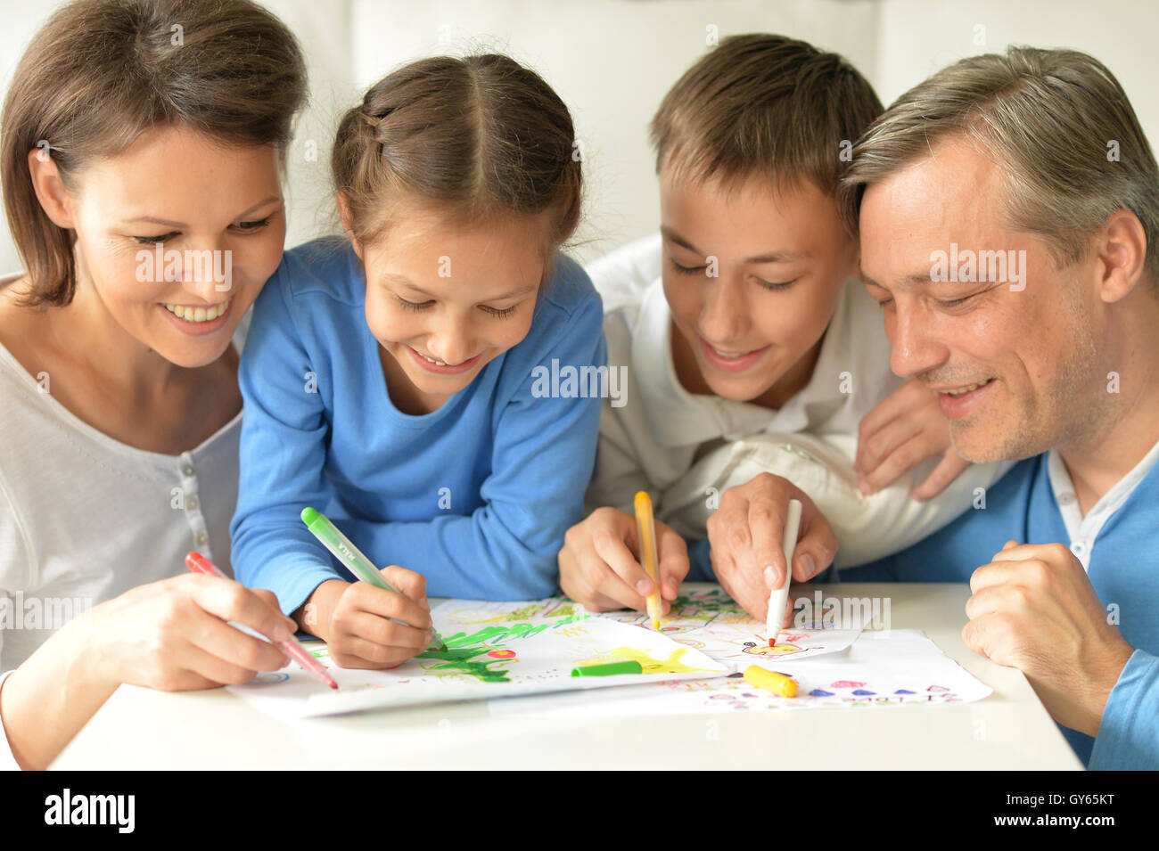 Portrait of happy family painting Stock Photo - Alamy